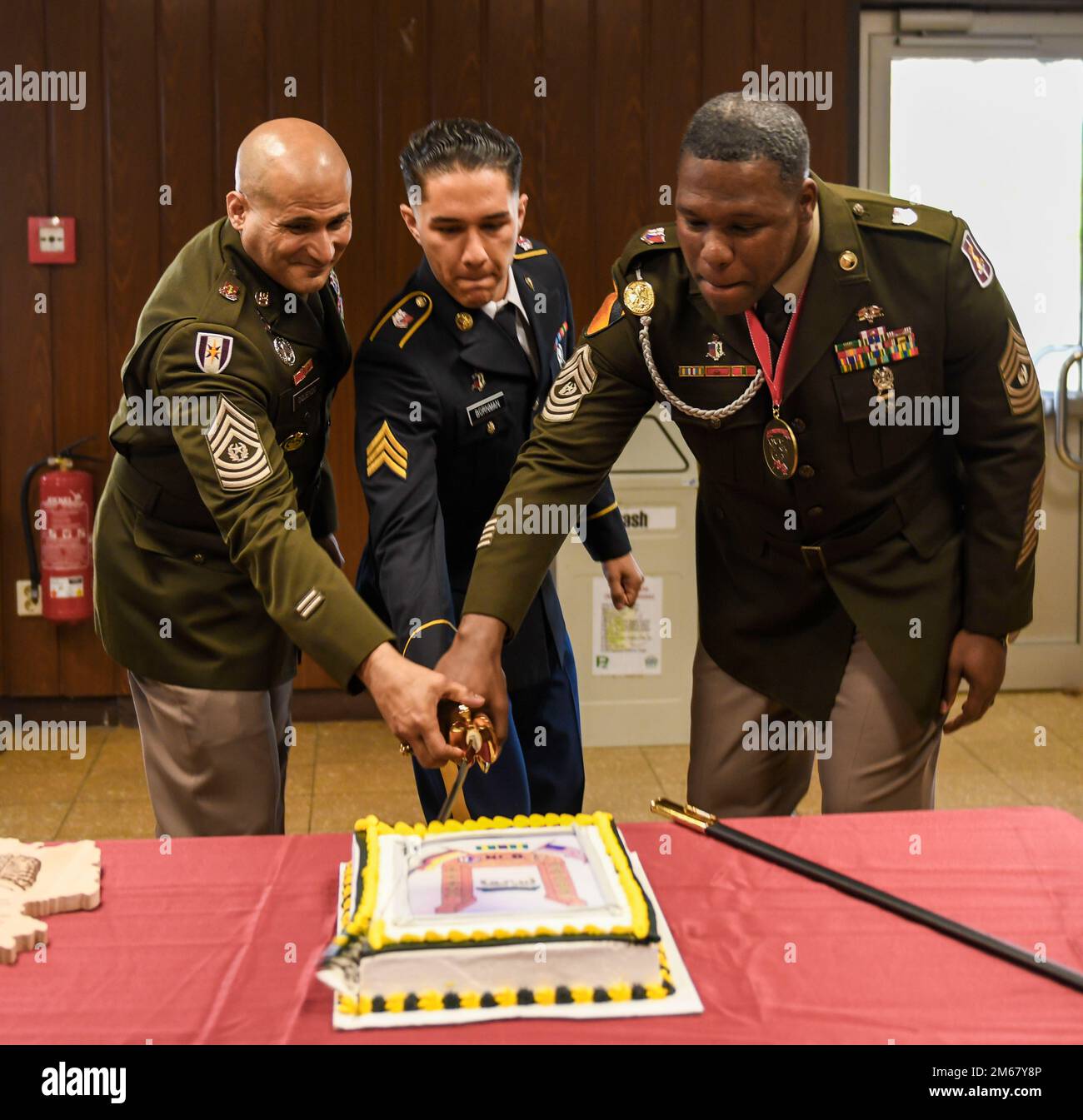 From left to right, Guest speaker Command Sgt. Maj. Jorge Oquendo, 30th ...