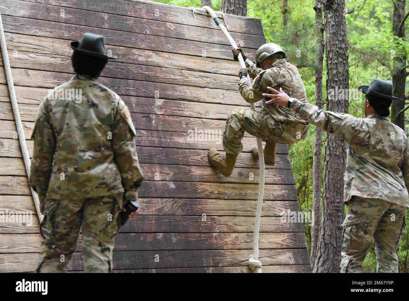 A Basic trainee completes obstacles at Fort Benning's Confidence Course ...