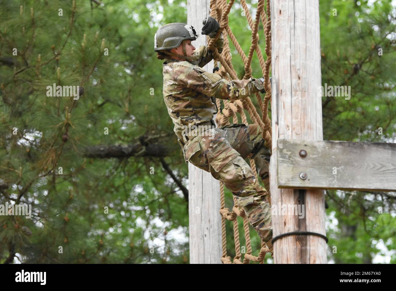 A Basic trainee completes obstacles at Fort Benning's Confidence Course ...