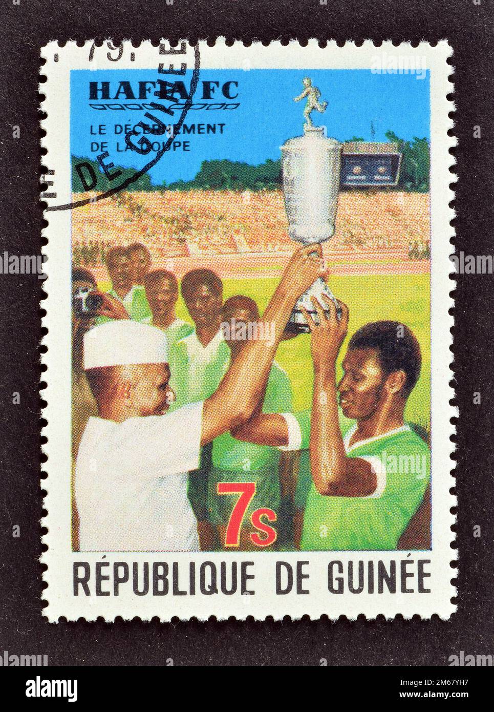 Cancelled postage stamp printed by Guinea, that shows Hafia Soccer Team ...