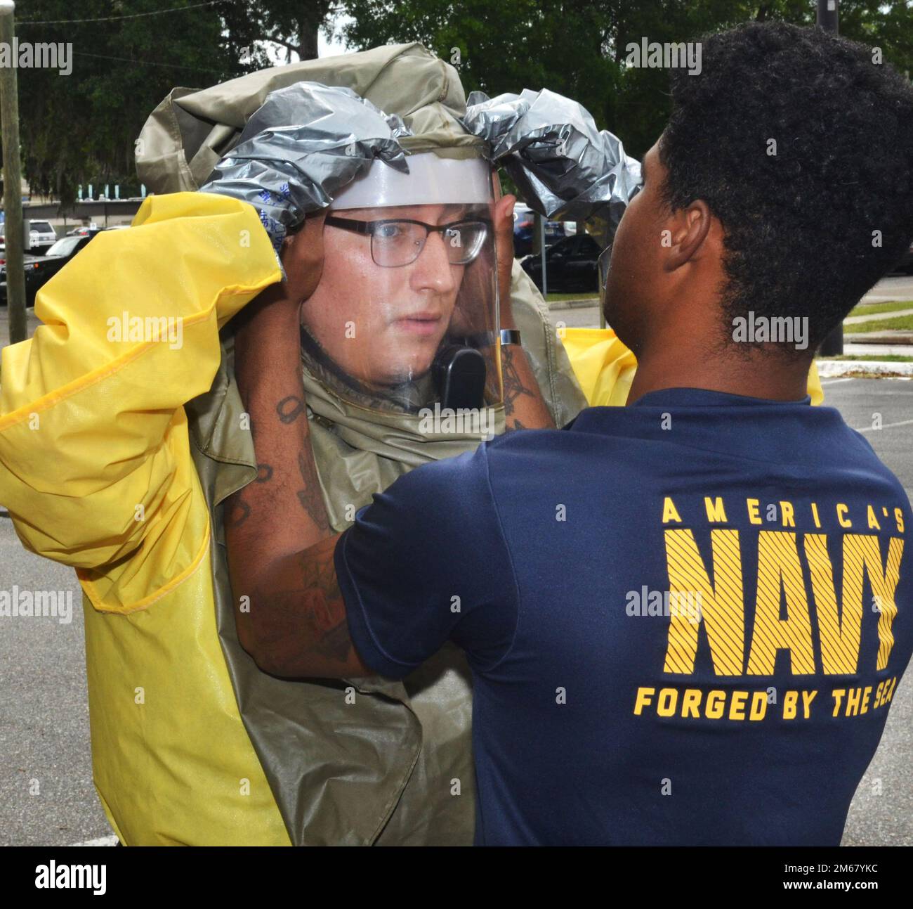 JACKSONVILLE, Fla. (April 14, 2022) - Hospital Corpsman 3rd Class Jameel Alston assists ...
