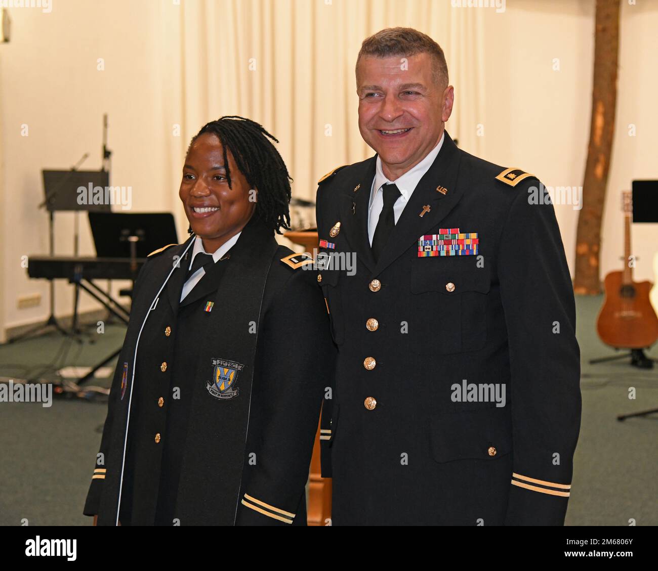 U.S. Army Chaplain (Maj.) Robert Ginsburg poses for a photo with new U ...