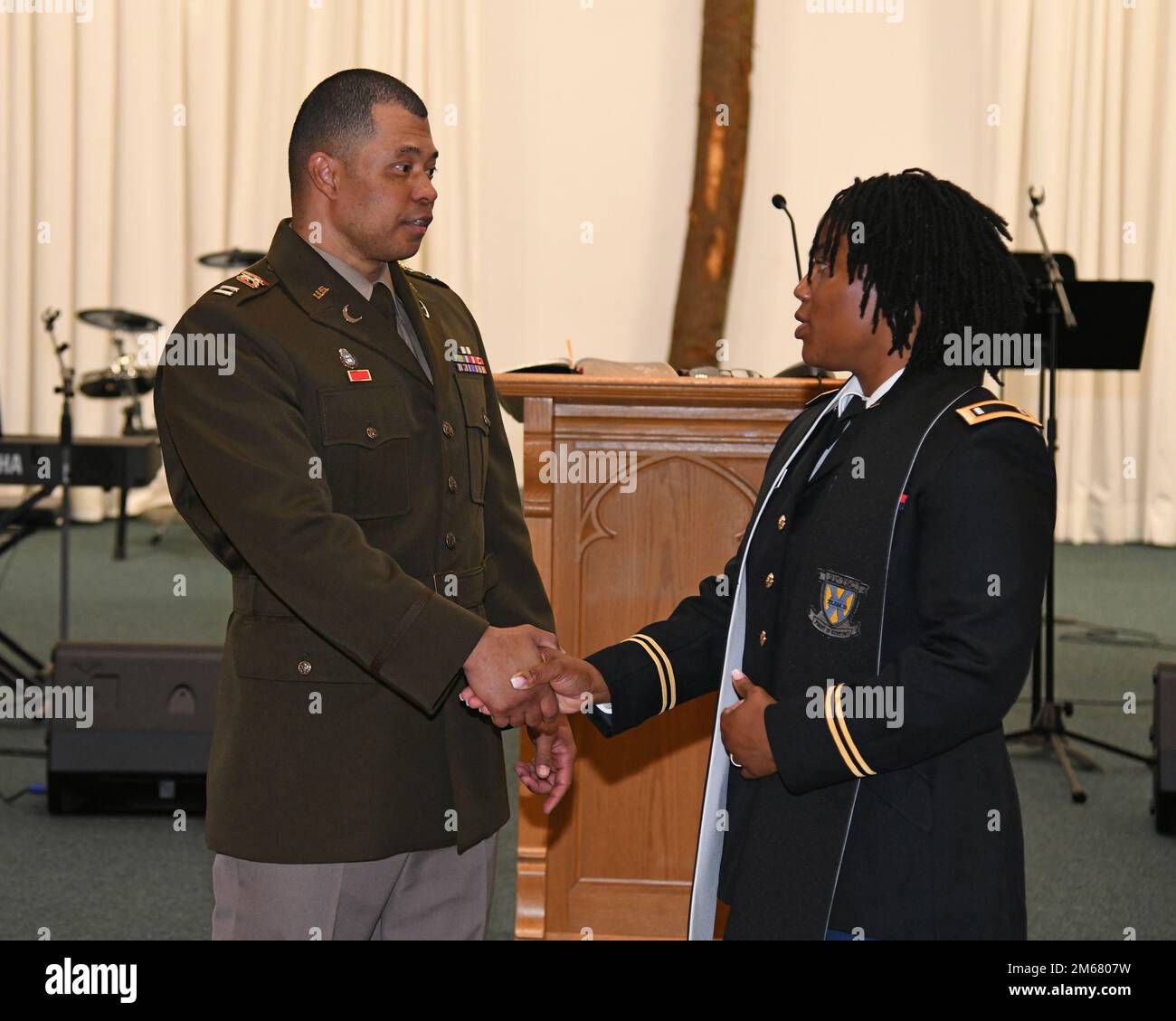 U.S. Army Chaplain (Capt.) Malik Skakoor congratulates Chaplain (1st Lt ...