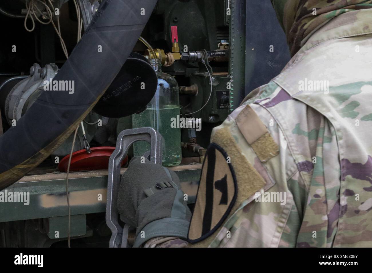 U.S. Army Spc. Antoine Smith, a fuel handler specialist assigned to 1st ...