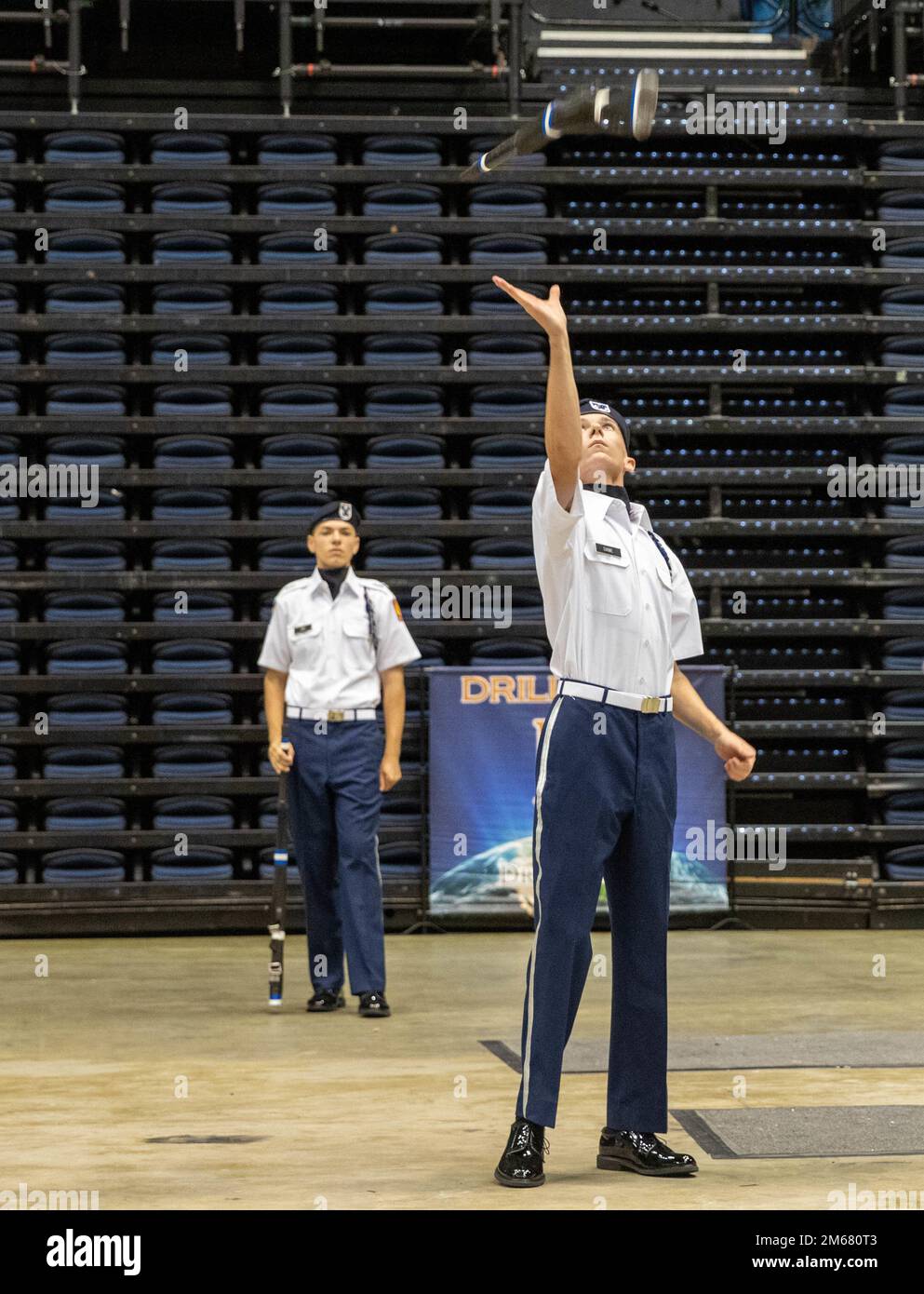 A Cadet from Ridge Community High School completes an overhead toss ...