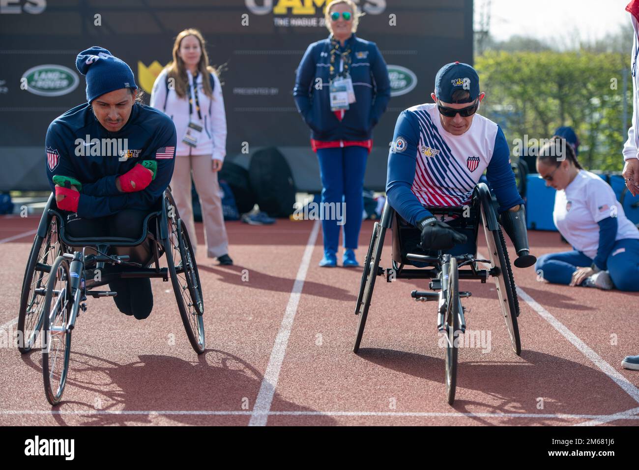 Retired U.S. Army Staff Sgt. Joel Rodriguez (left) and U.S. Marine ...
