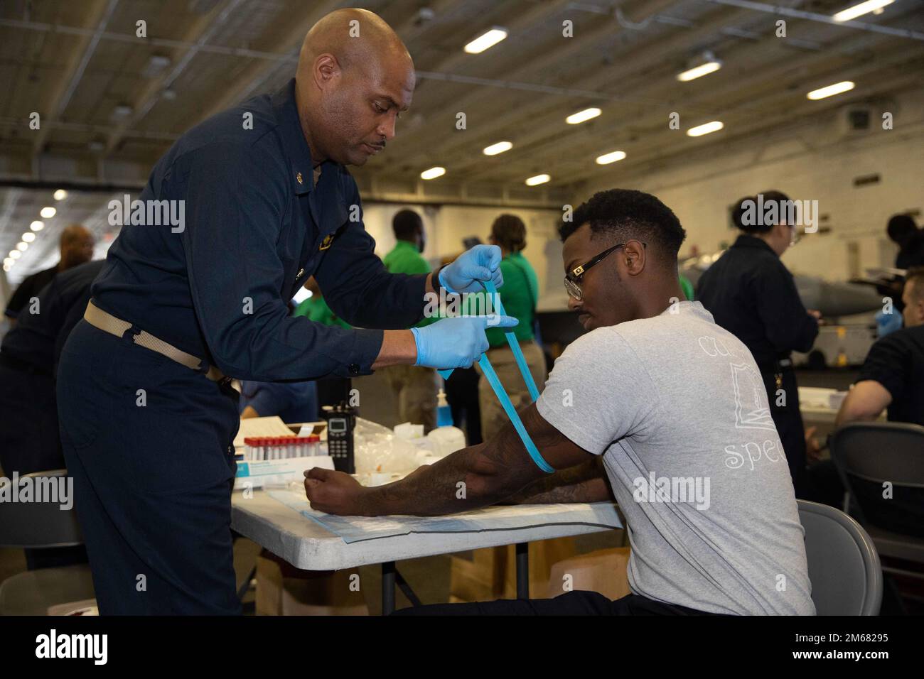 Senior Chief Hospital Corpsman Phillip Jean-Gillies, left, from Miami ...