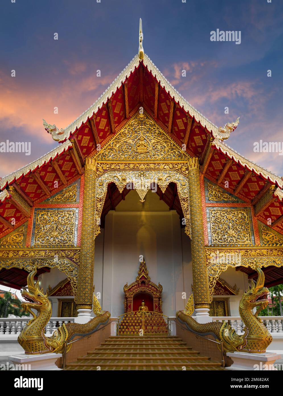 Wat Phra Singh Woramahawihan Buddhist Temple at sunset . It is one of ...