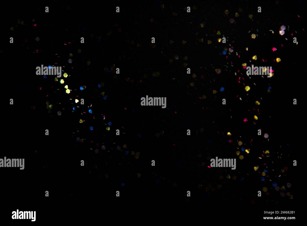 Party Colorful Glitter Confetti on Black Background Stock Photo - Alamy