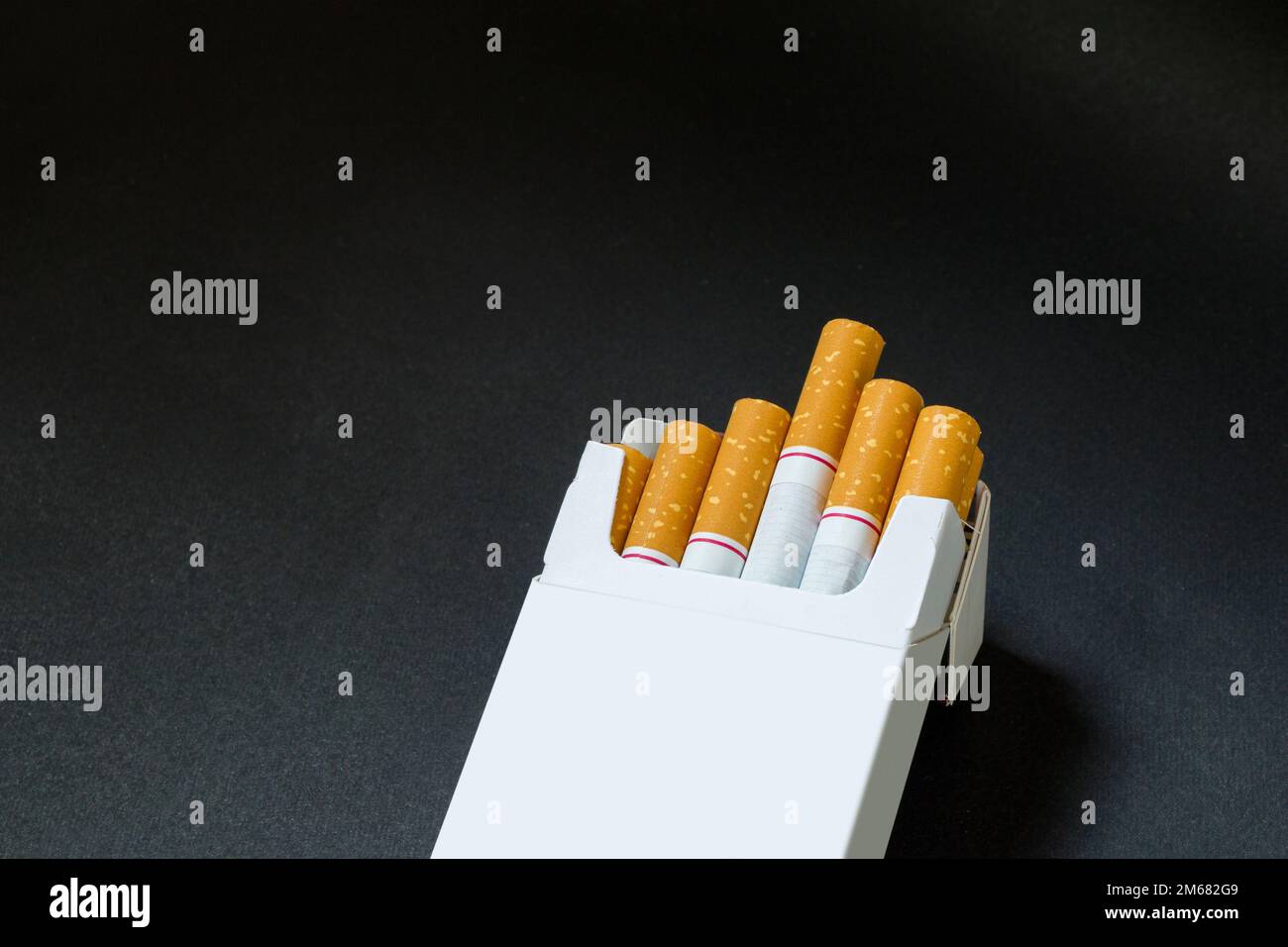 an open pack of cigarettes Stock Photo - Alamy