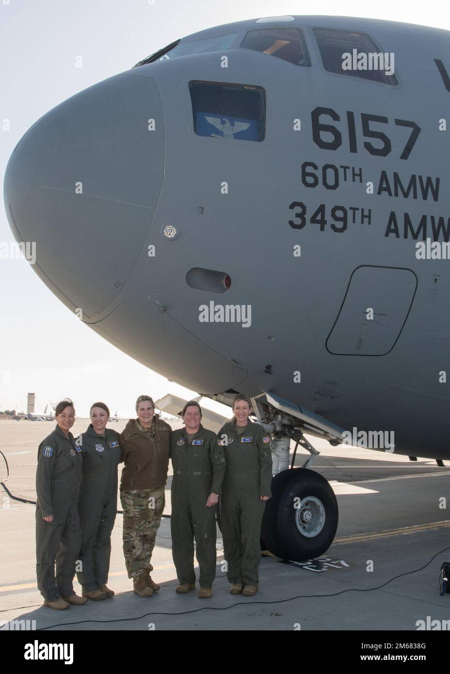 An all-female flight crew poses for a photo prior to take-off on a ...