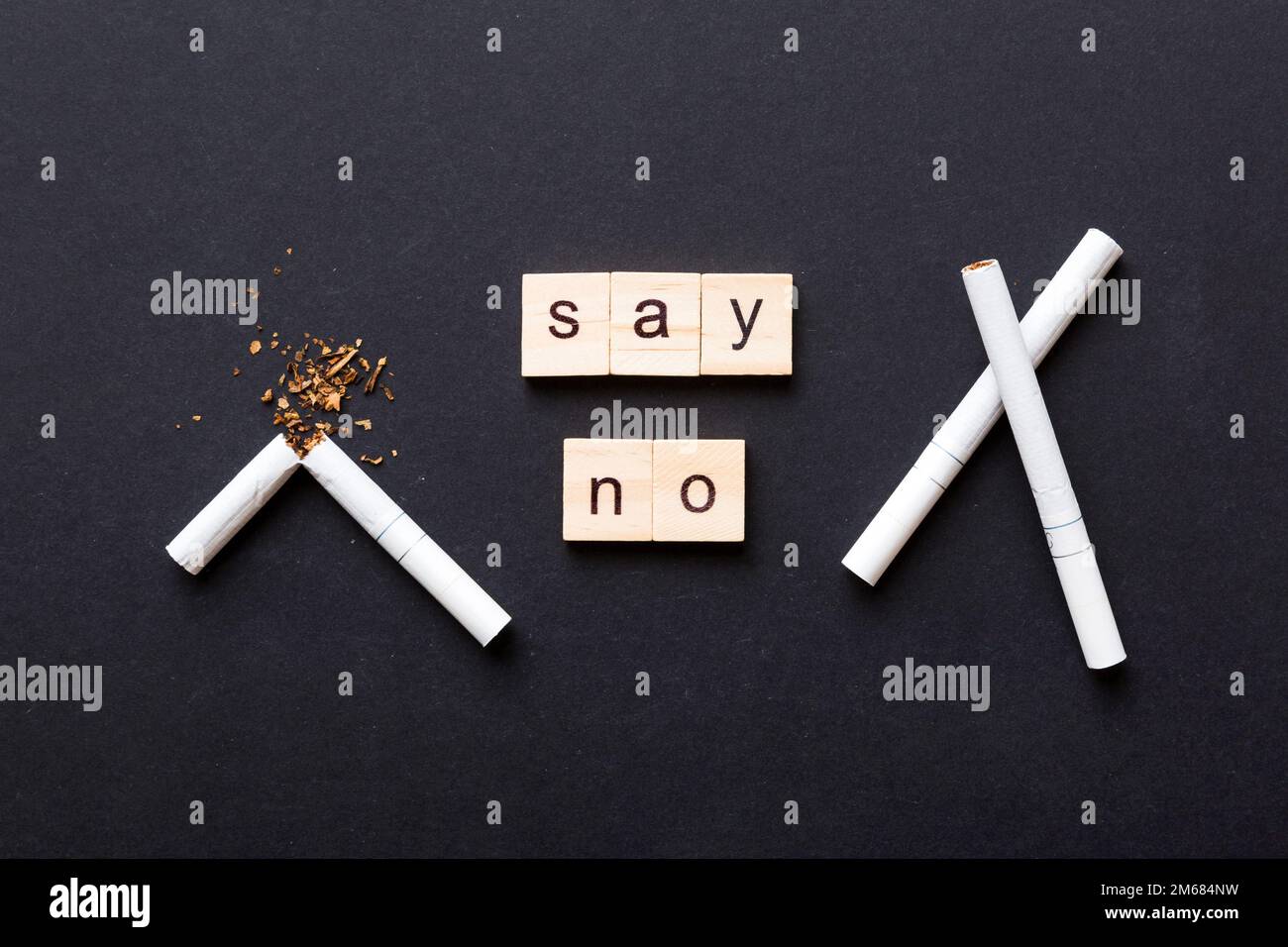 Cigarette And Wooden Blocks, Broken cigarette on table background, No ...