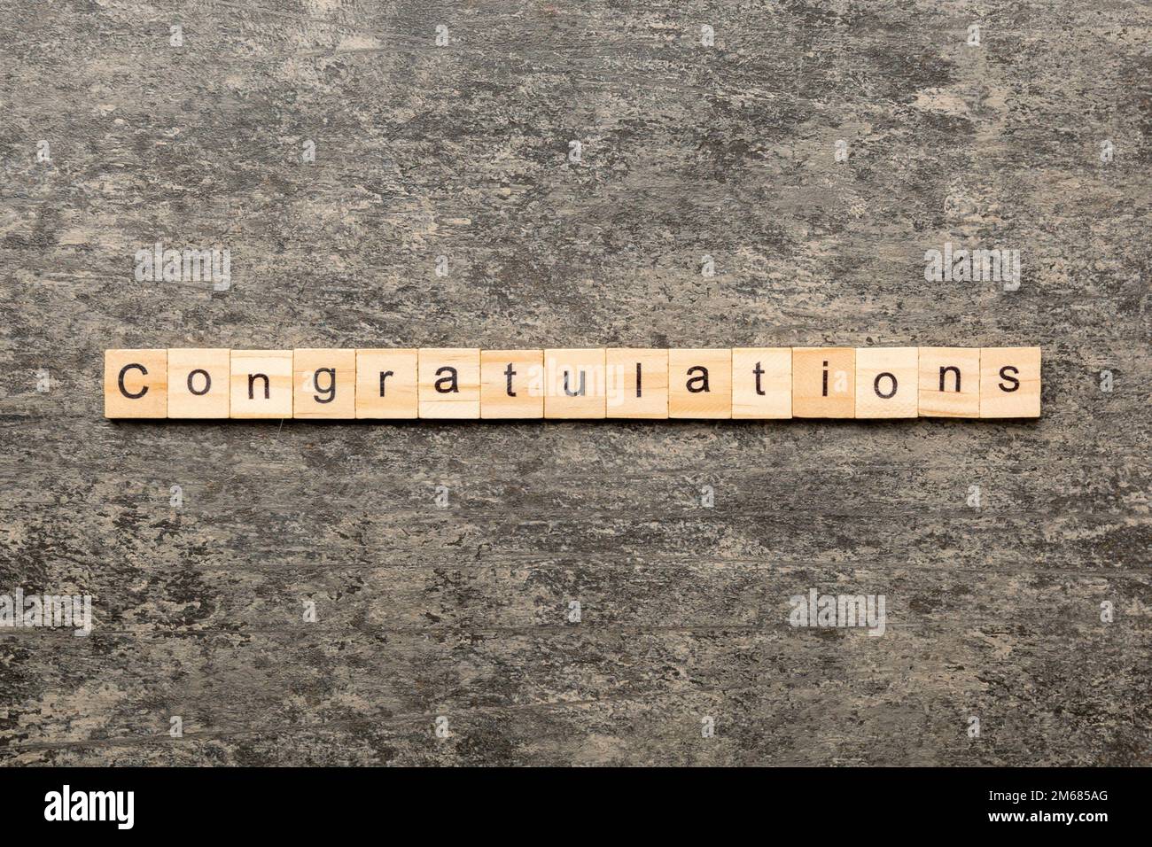 congratulations word written on wood block. congratulations text on ...