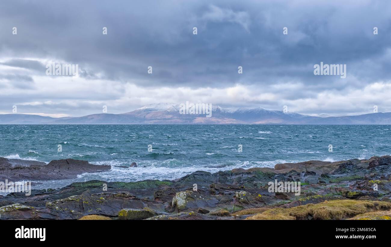 The Isle of Arran with the first snows on the mountains looking across ...
