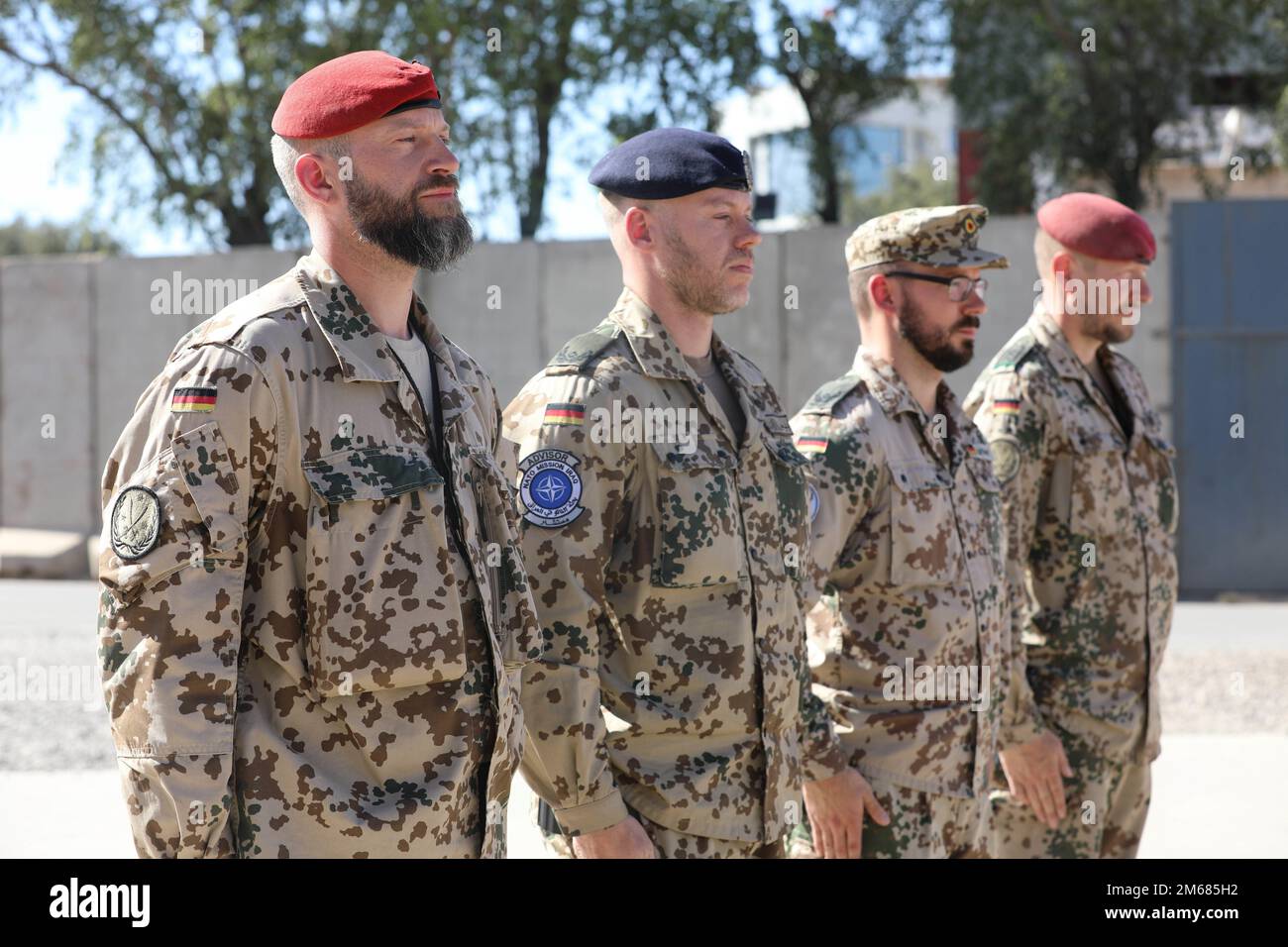 German soldiers stand at the position of attention during a German ...