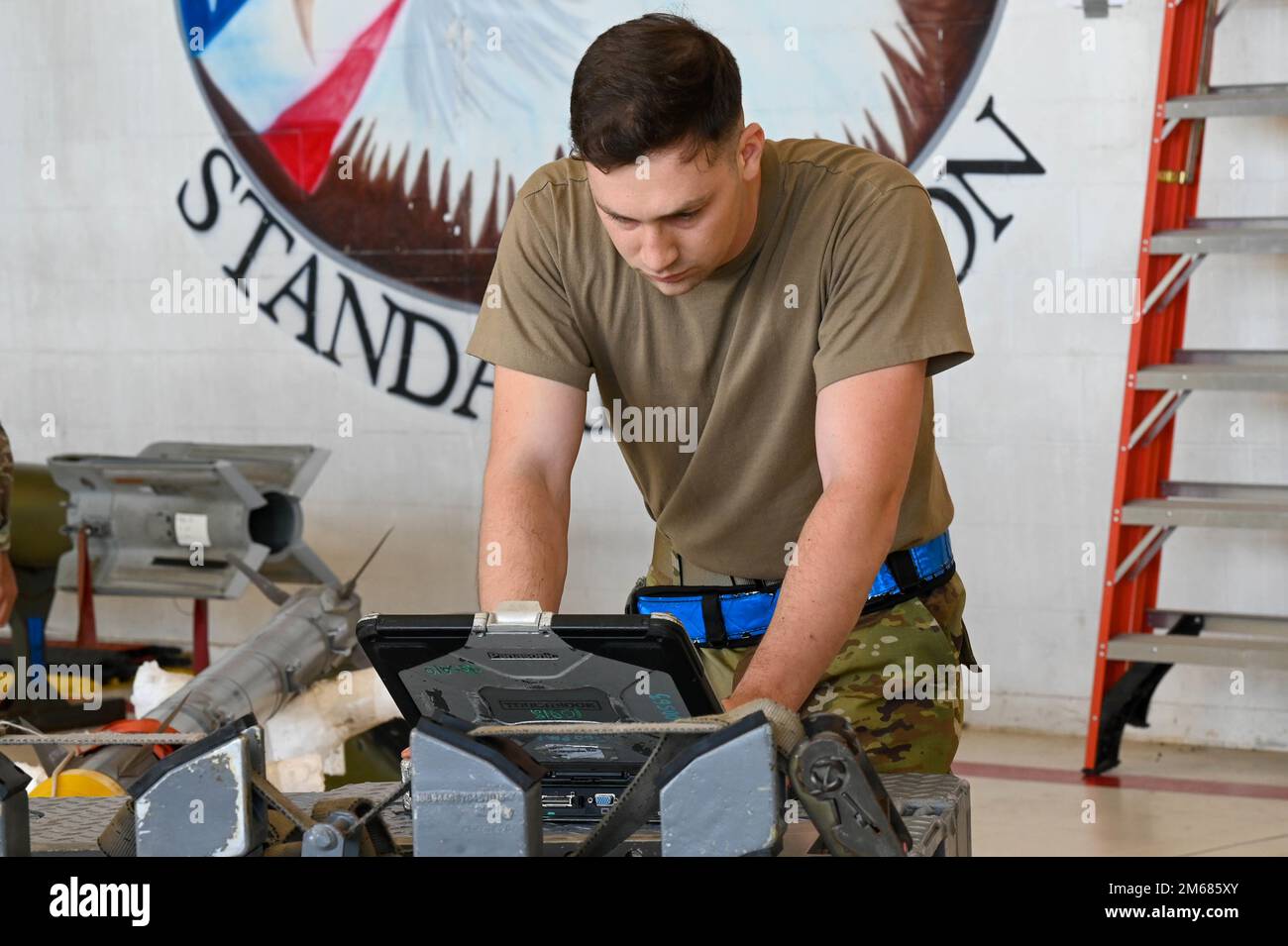 U.S. Air Force Staff Sgt. Trevor Fassett, weapons load crew member from ...