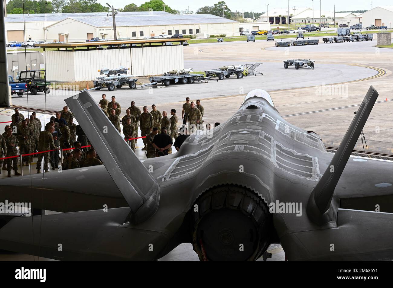 U.S. Air Force Airmen gather near a F-35A Lightning II aircraft during ...