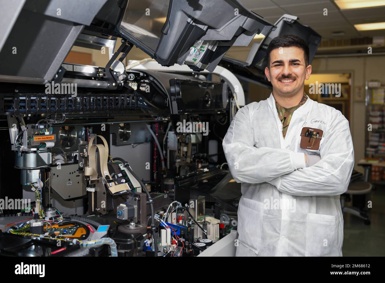 Staff Sgt. Johnathan Garcia manages and coordinates monthly deliveries ...