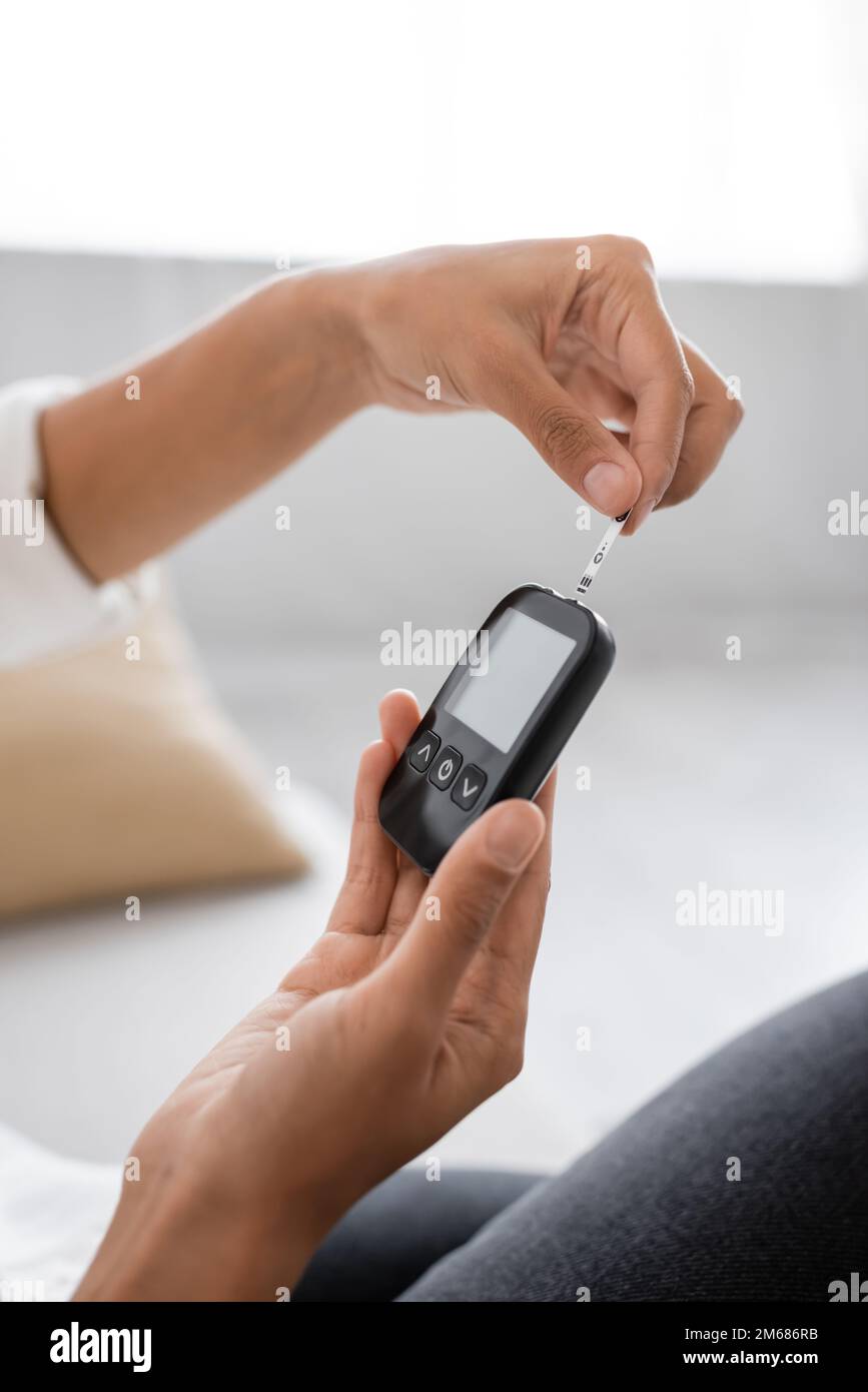 Using glucometer hi-res stock photography and images - Alamy