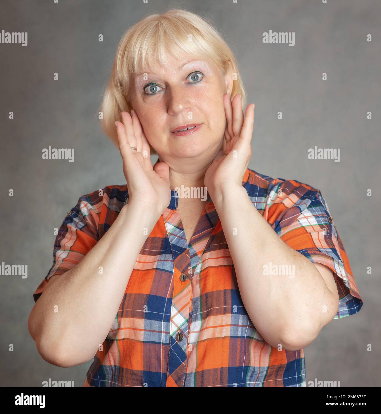 Middle aged woman portrait on dark background. Color toned image Stock ...