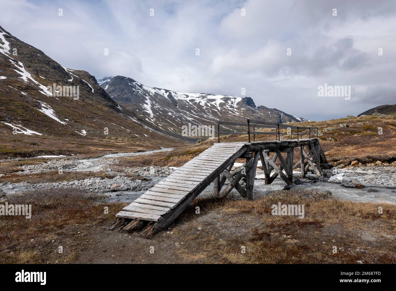 A beautiful shot of a bridge over a stream on Visladen valley in ...
