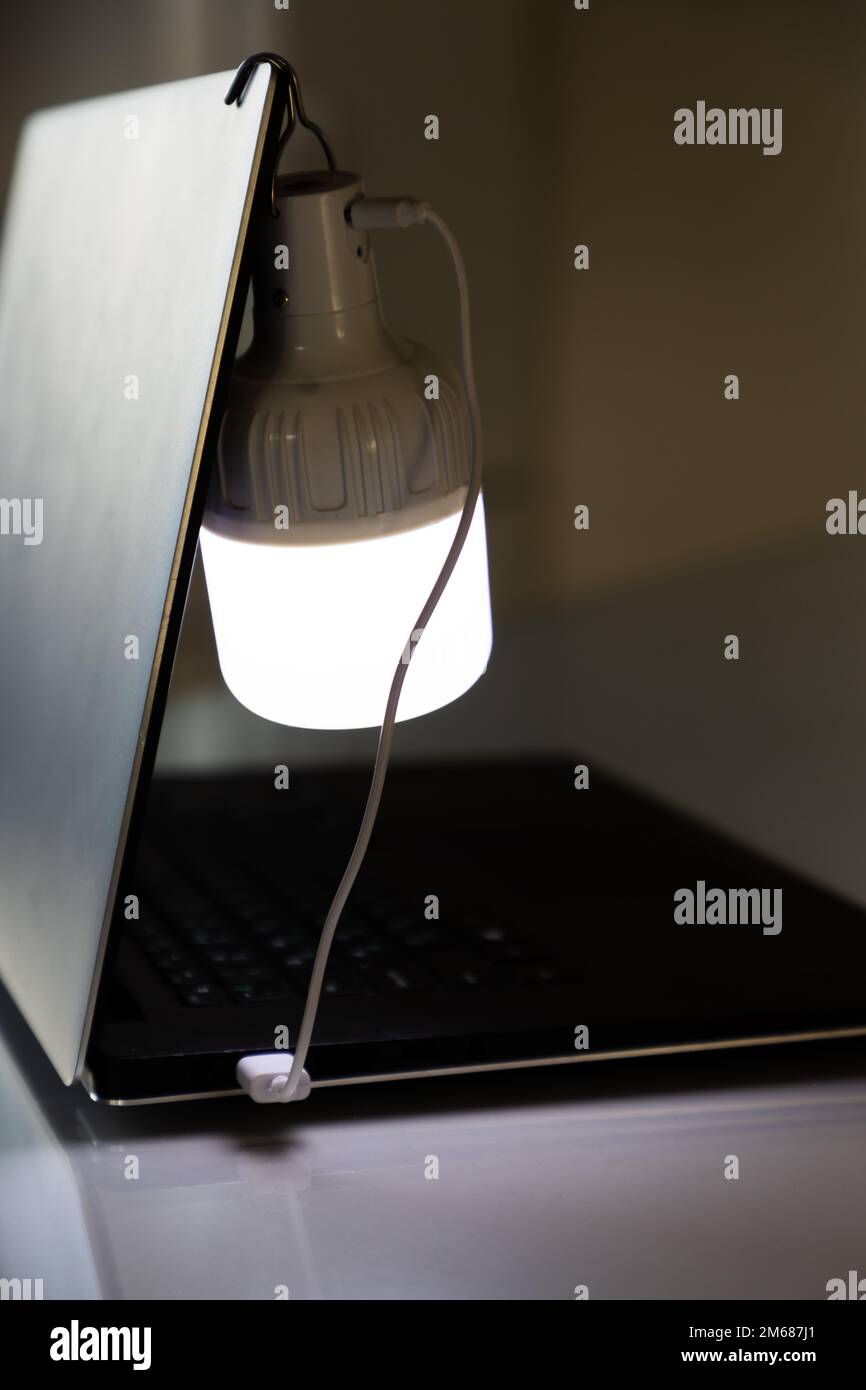 Portable rechargeable LED emergency light with built-in battery is ...