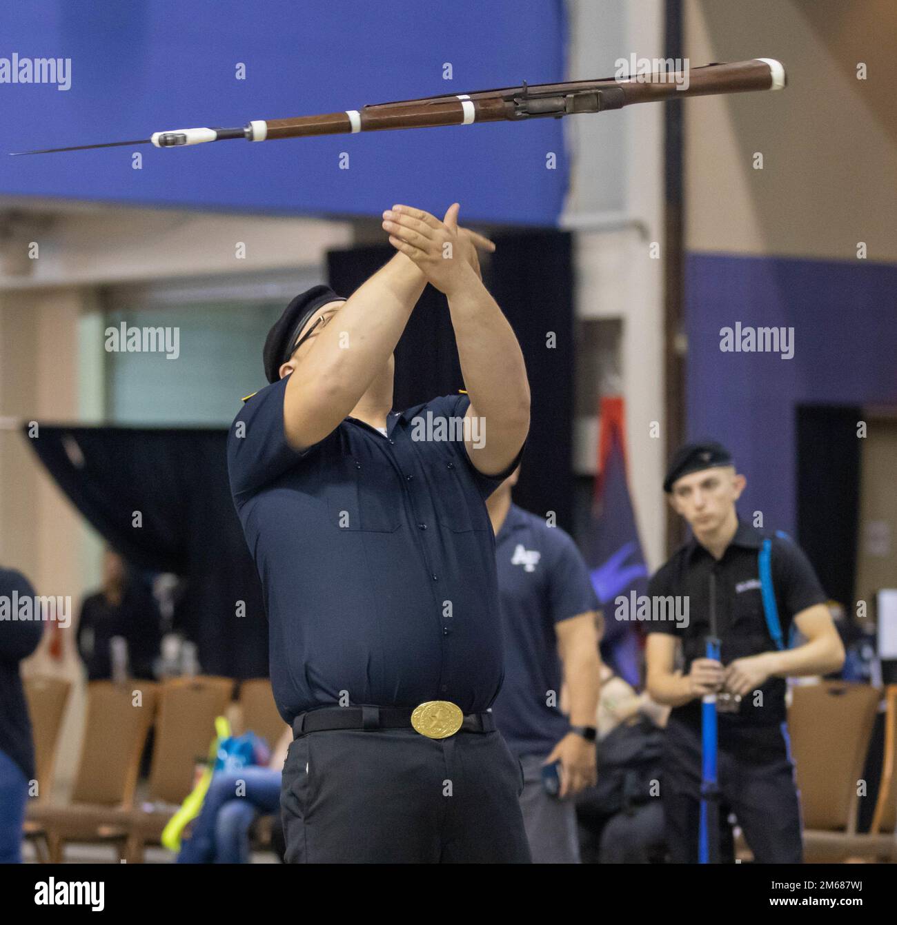 Trey Simmons, an independent drill competitor, completes an overhead ...