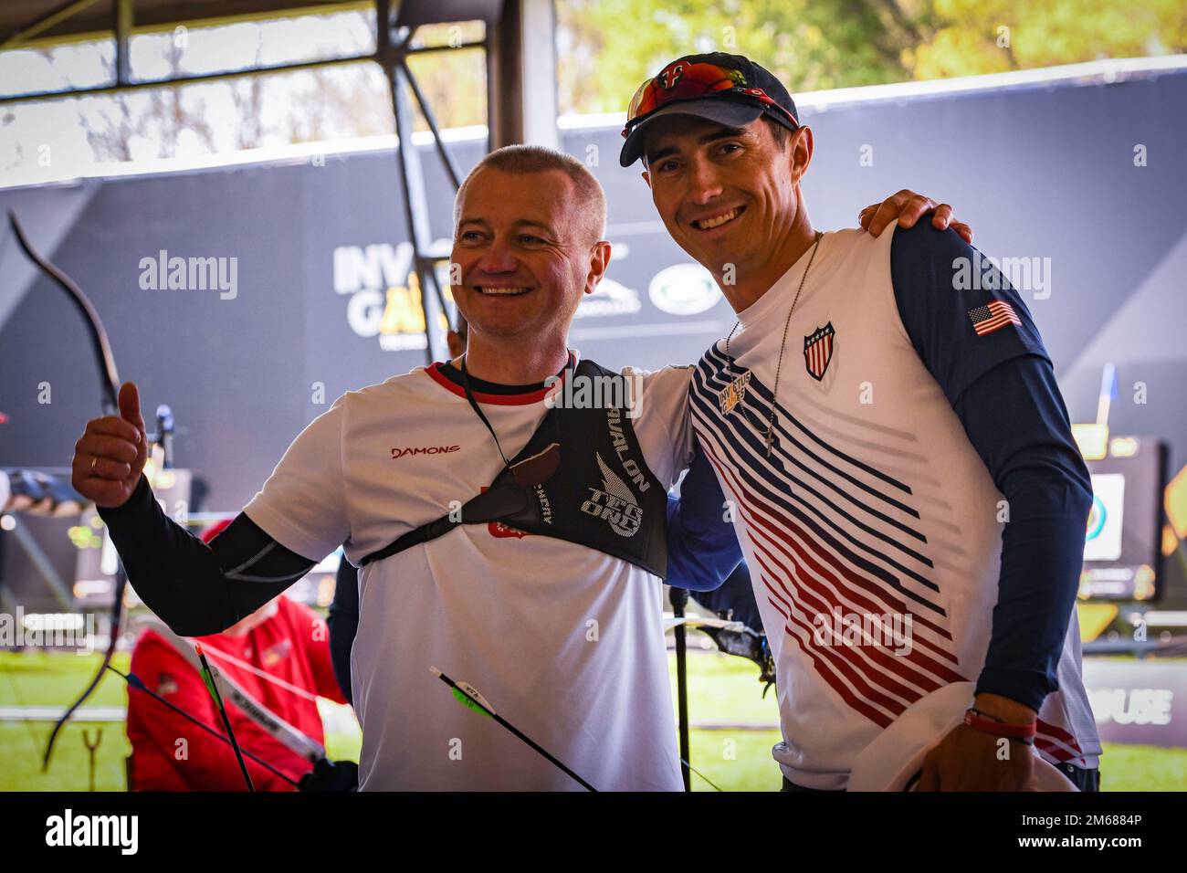 U.S. Marine Corps Sgt. Patrick MacDonald and an athlete from Poland ...