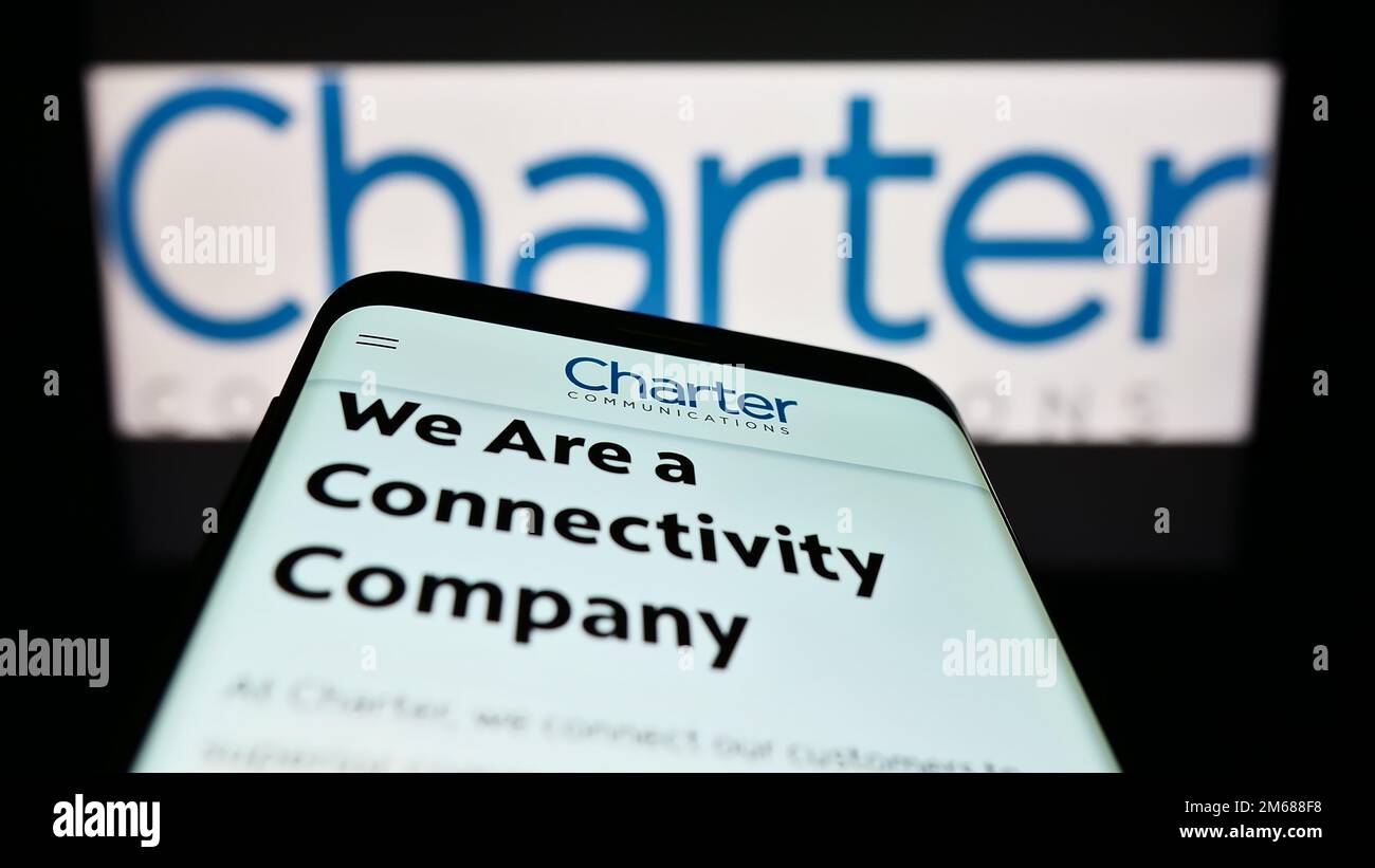 Smartphone with website of US media company Charter Communications Inc ...