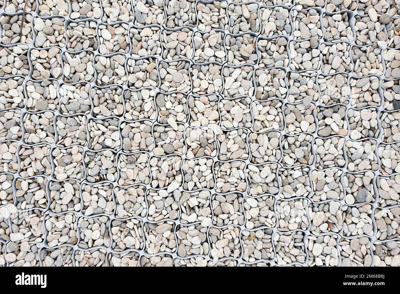 Seamless plain white gravel texture with plastic garden grate ...