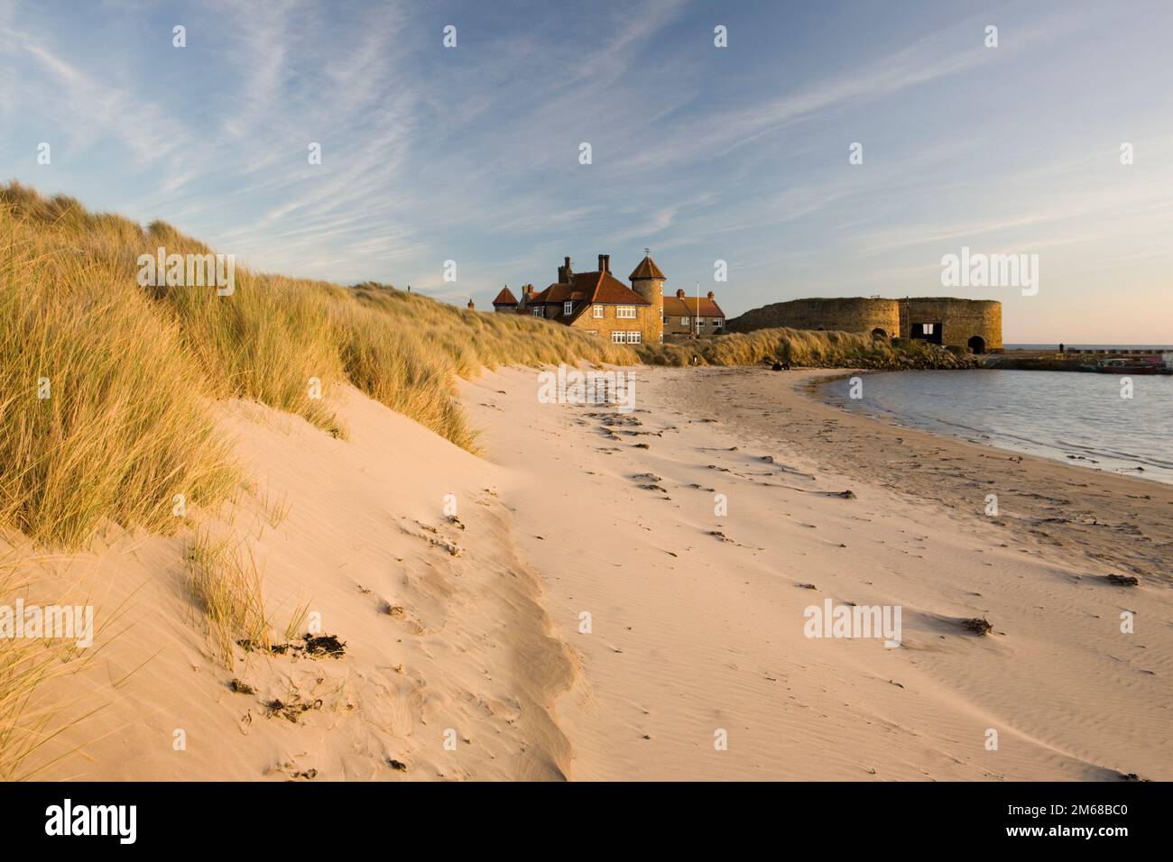 Clean sandy beach at Beadnell Bay on the Northumberland coast of ...