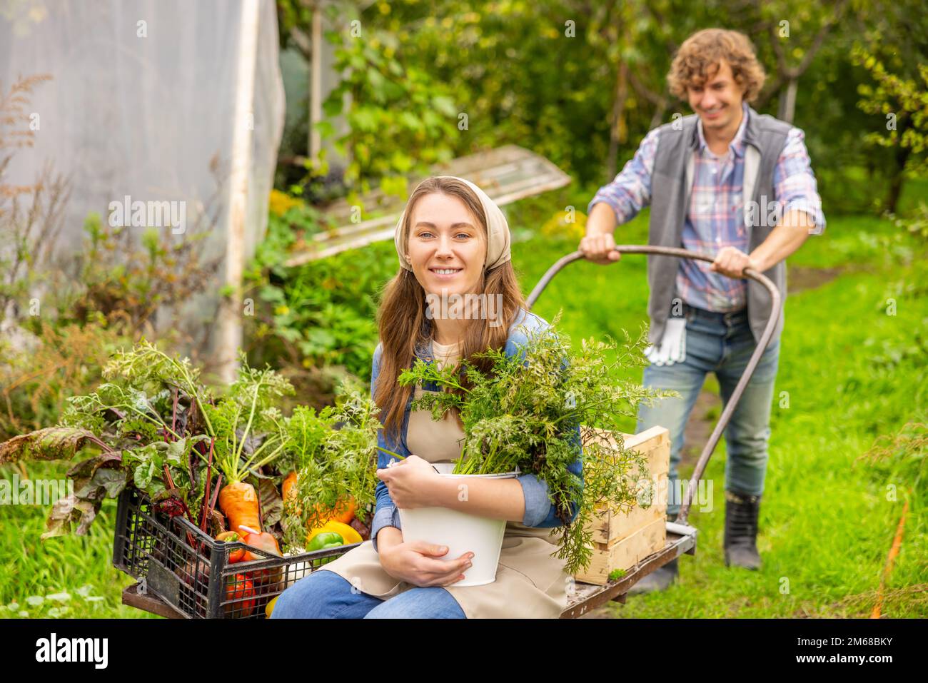 Farm workers posing for the camera in the countryside Stock Photo - Alamy