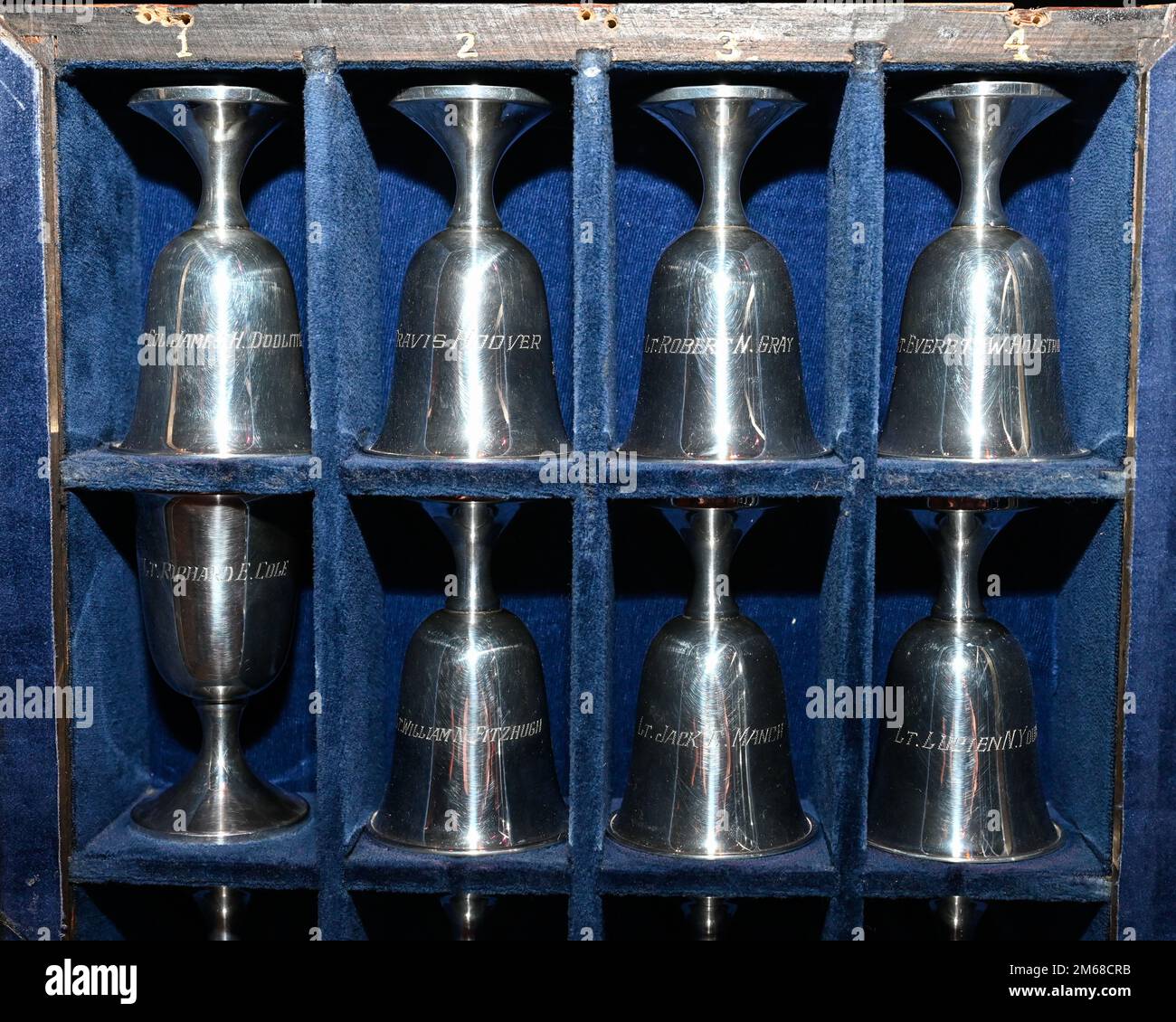 Engraved silver goblets that represent each of the Doolittle Raiders ...