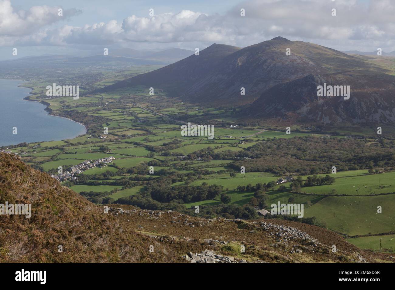 Views across the North Wales coast and Snowdonia from the summit of Yr ...