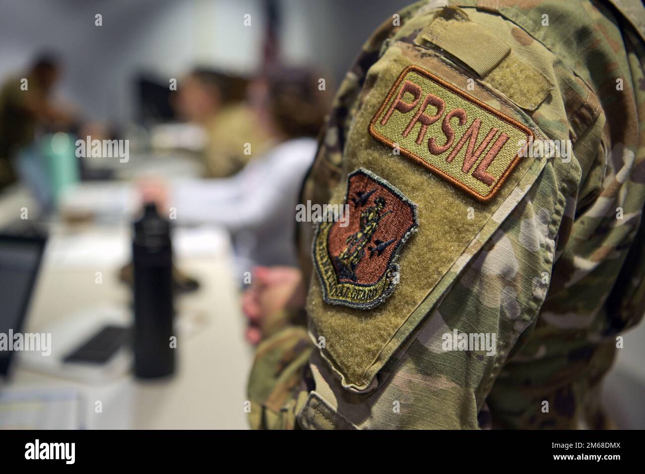 A U.S. Airman with the 156th Force Support Squadron, discusses the ...