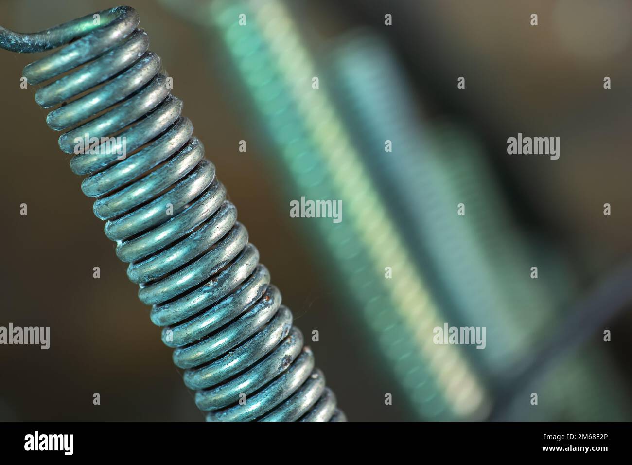 metal springs standing in a row on the soil-processing unit Stock Photo ...