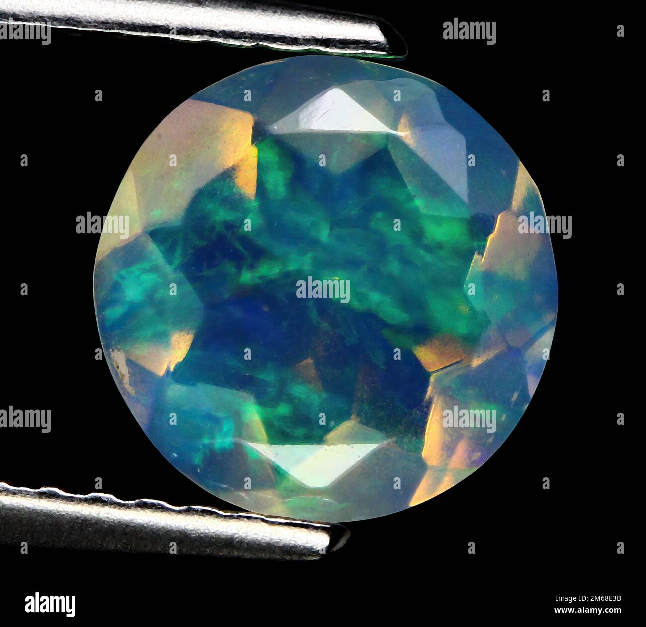 Natural beautiful stone opal on gray background Stock Photo - Alamy
