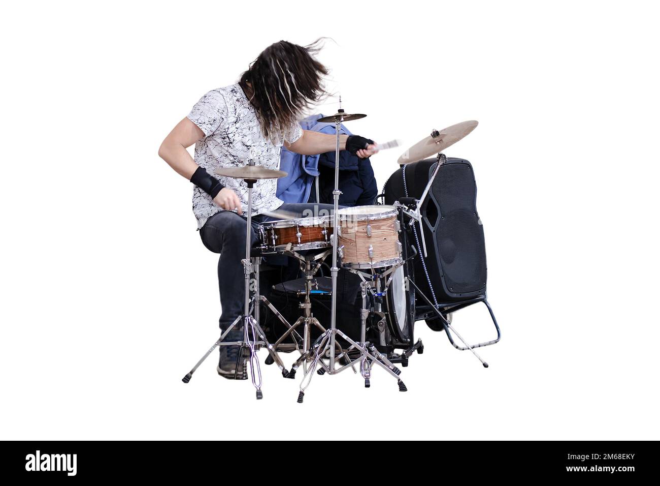 Male musician drummer playing a musical instrument at a public ...