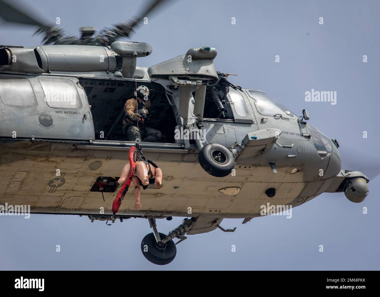 Naval Aircrewman (helicopter) 2nd Class Tyler Christoffer, assigned to ...