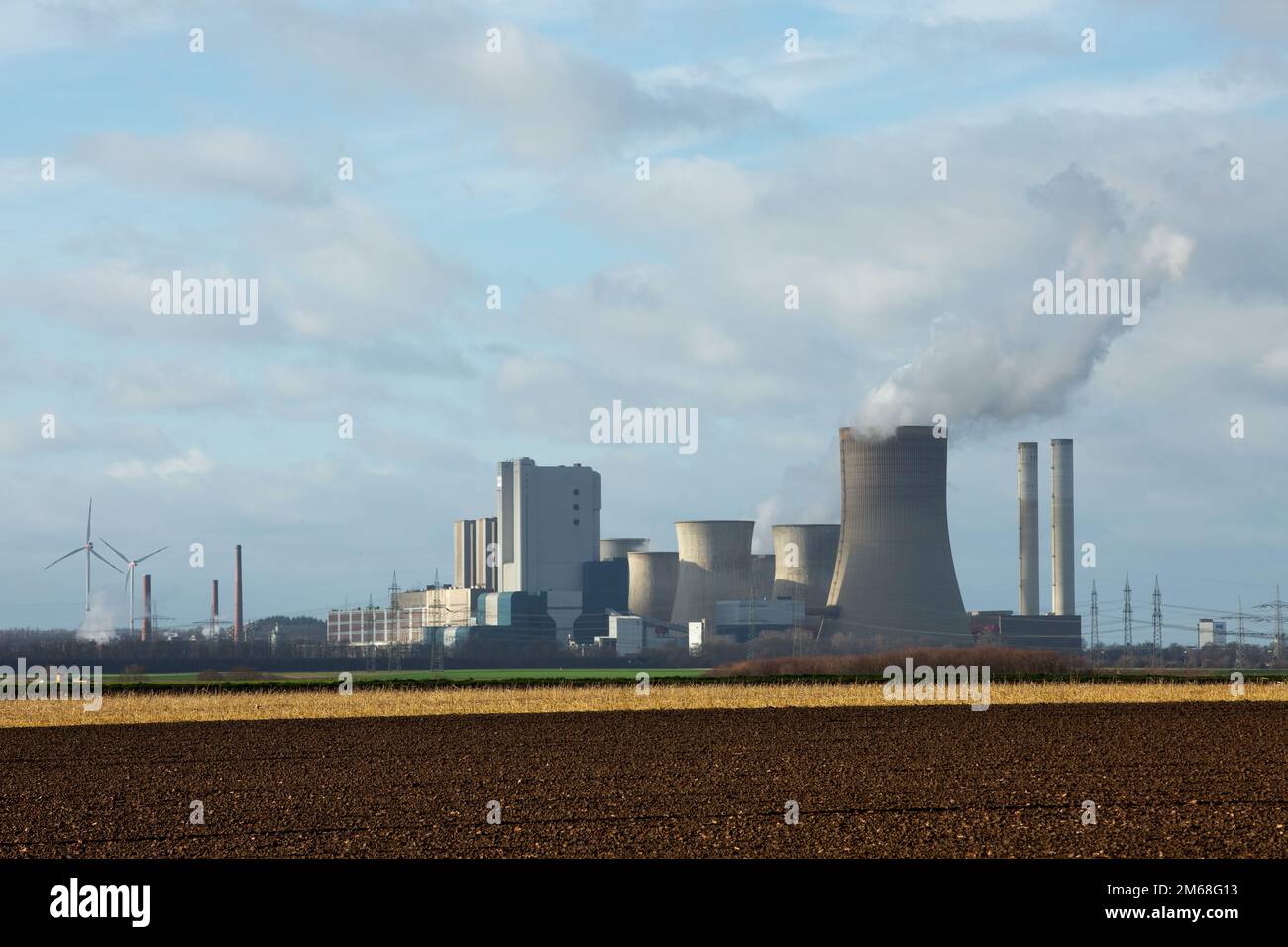Bergheim, Germany. 29th Dec, 2022. Steam rises from a cooling tower at ...