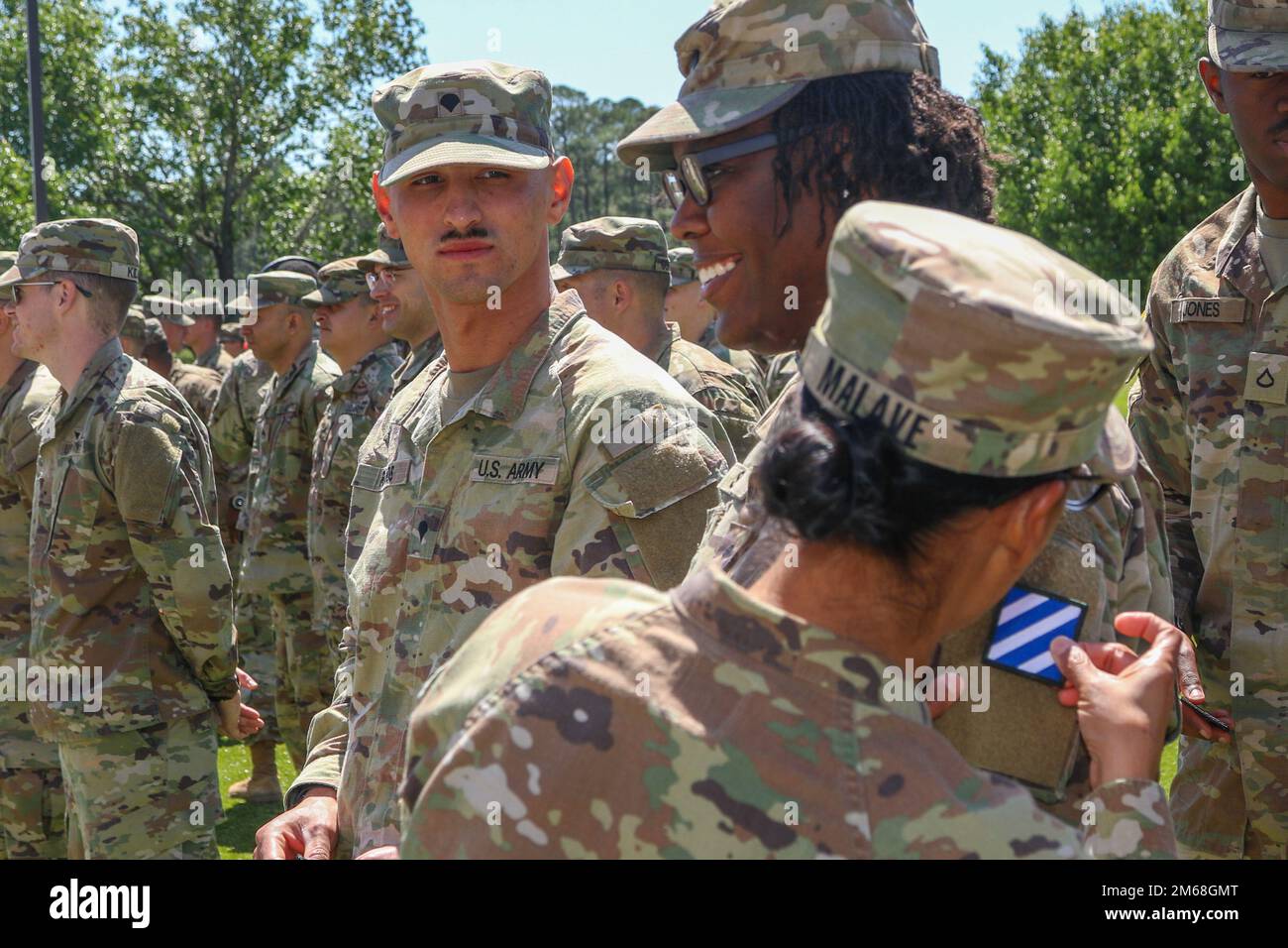 A Soldier newly assigned to the 3rd Infantry Division, receives a 3rd ...