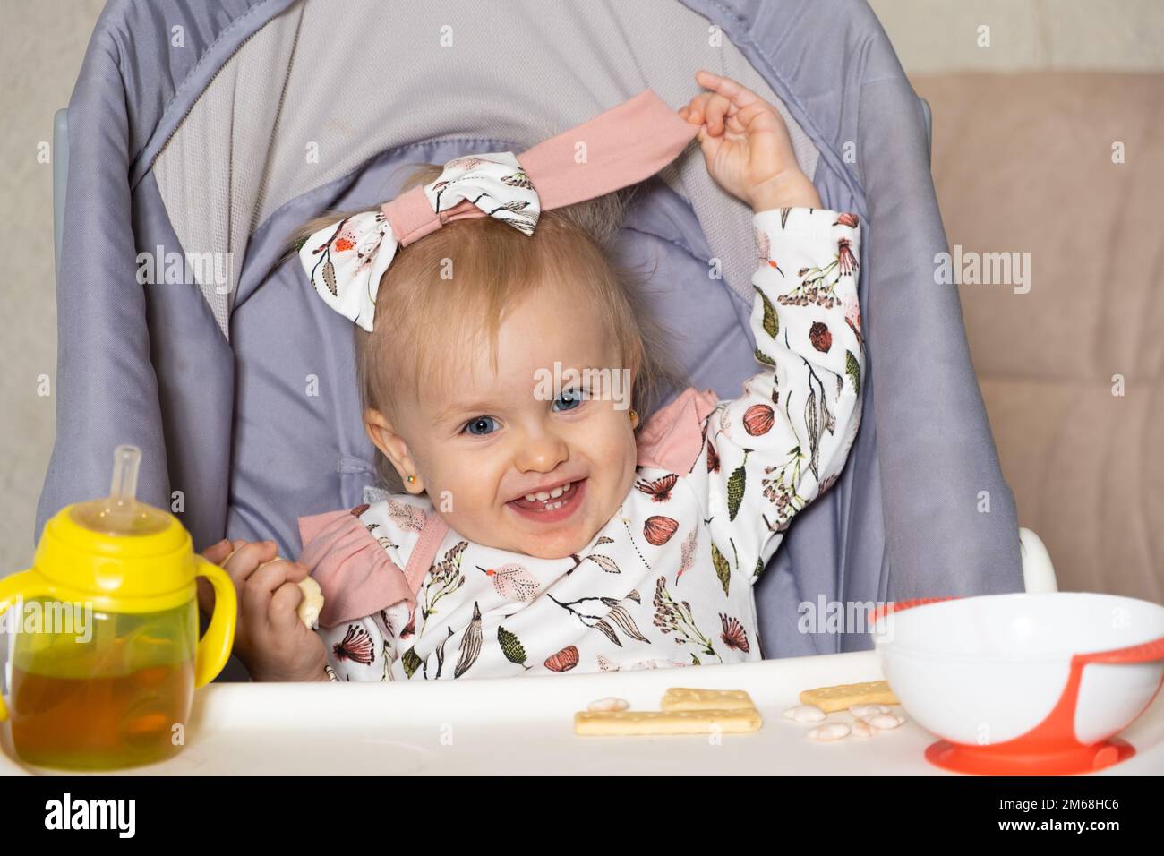 Girl by a high chair hi-res stock photography and images - Alamy