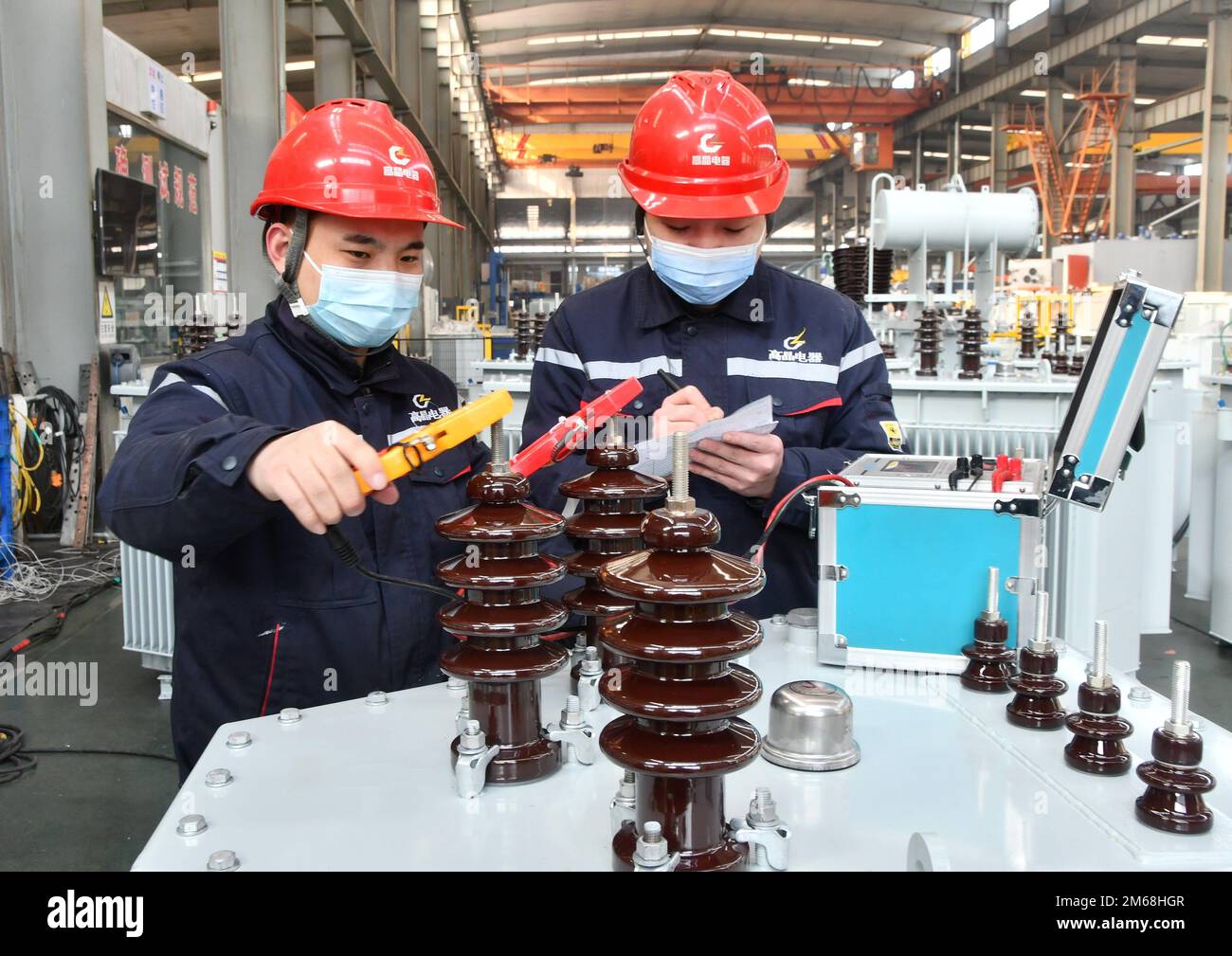 HANDAN, CHINA - JANUARY 3, 2023 - Workers test transformers at a ...