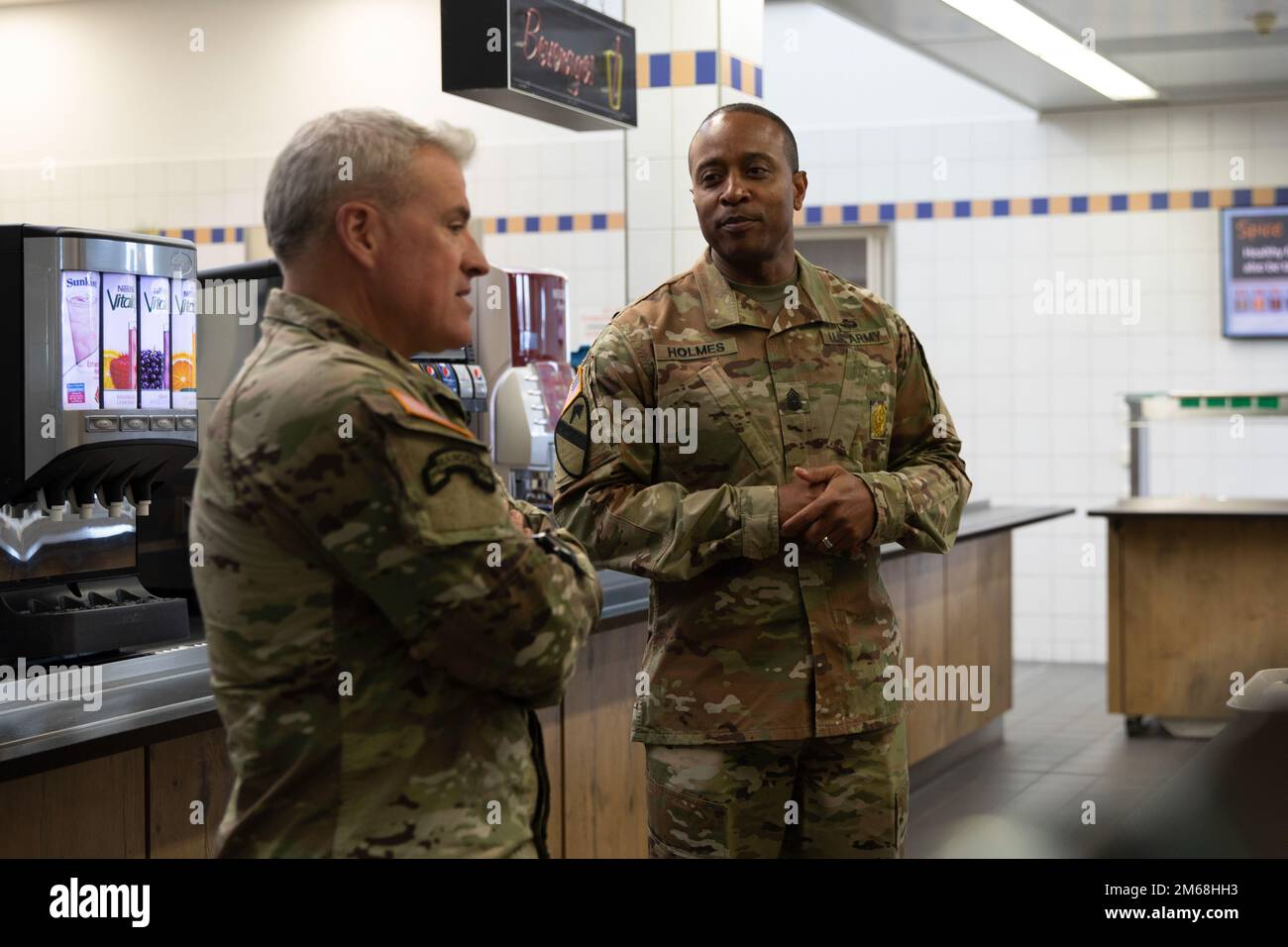 U.S. Army Europe and Africa’s Command Sgt. Maj. Jeremiah E. Inman converses with Command Sgt ...