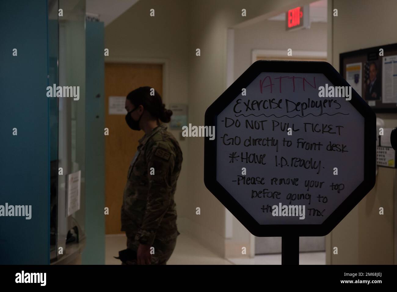 A simulated deployer stands in line at the 633d Medical Group ...