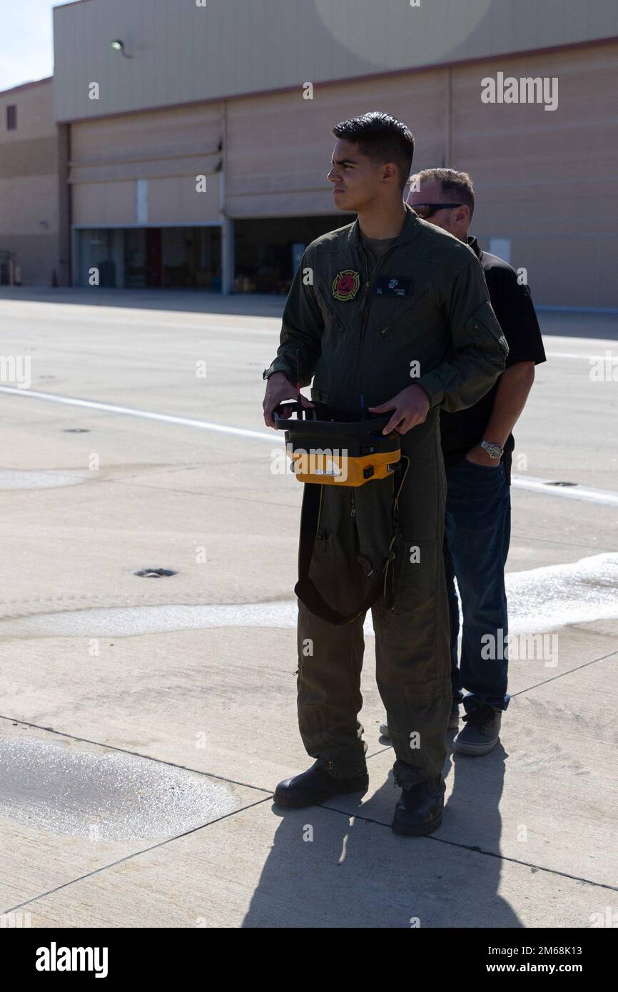 U.S. Marine Cpl. Edward Lozano, a firefighter with Aircraft Rescue and Firefighting ...