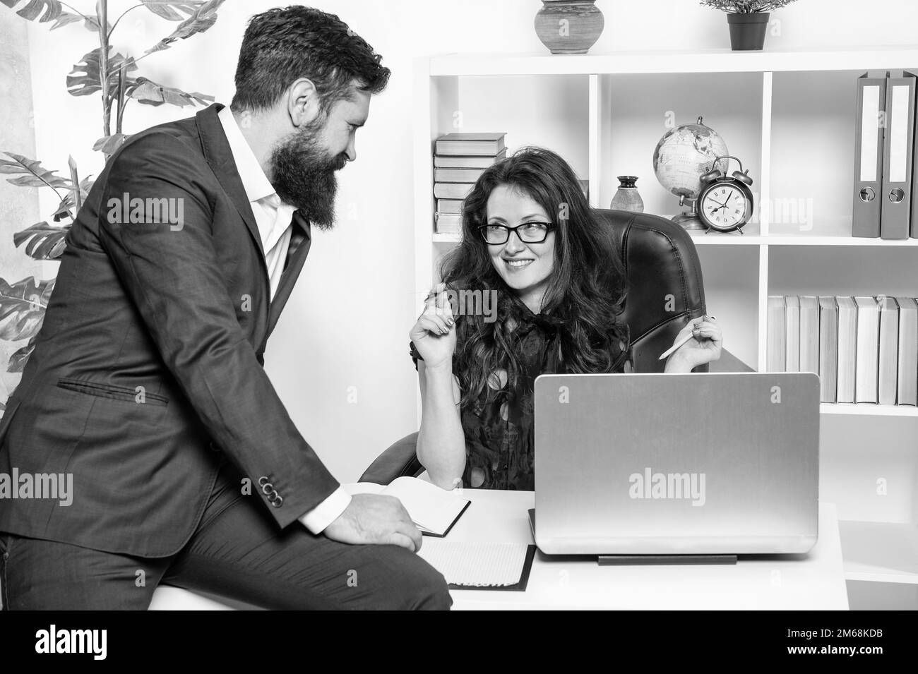 Happy professional woman flirting with man colleague in office, flirt ...