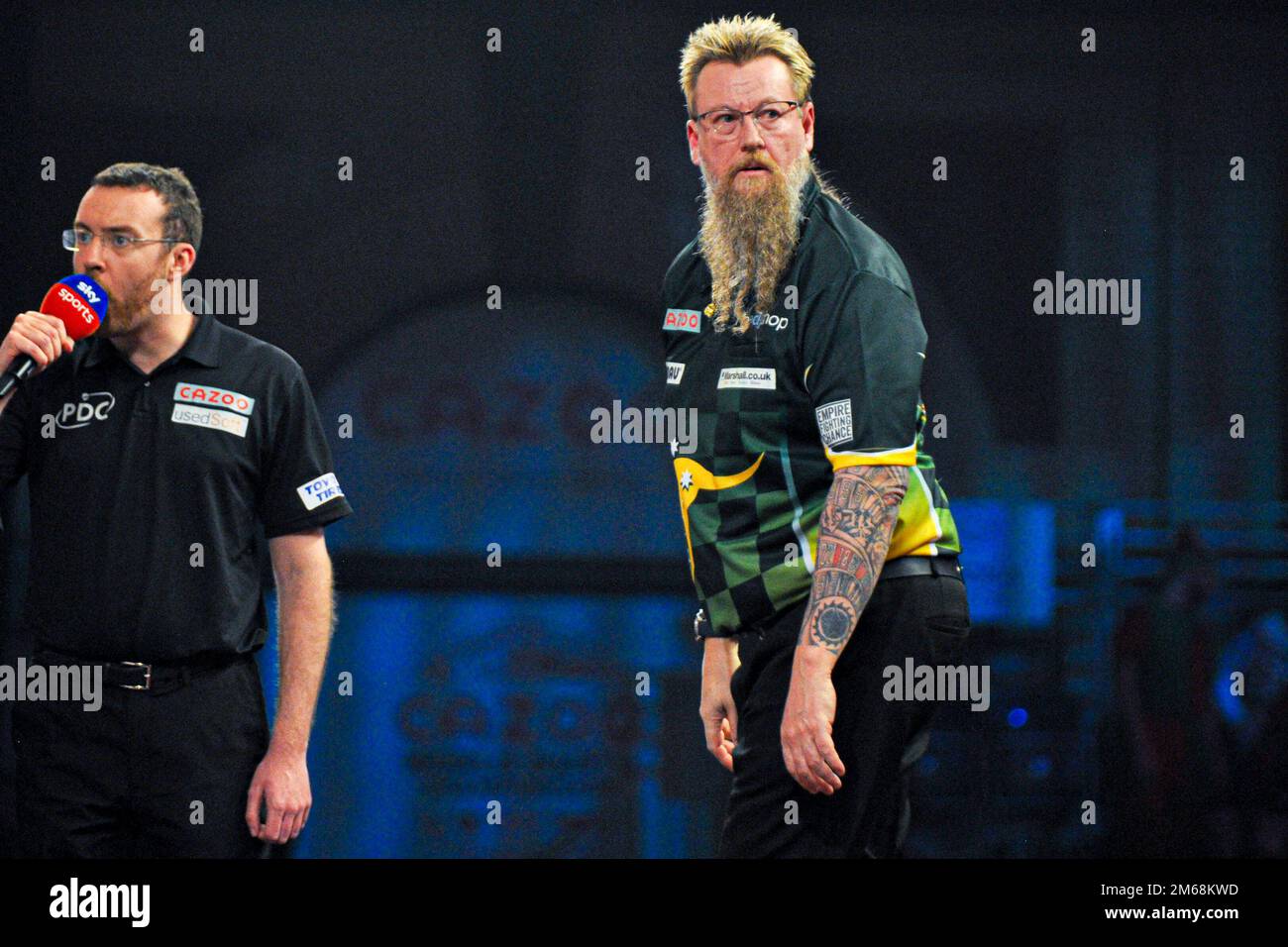 LONDON, ENGLAND - DECEMBER 19: Simon Whitlock of Australia looks on ...