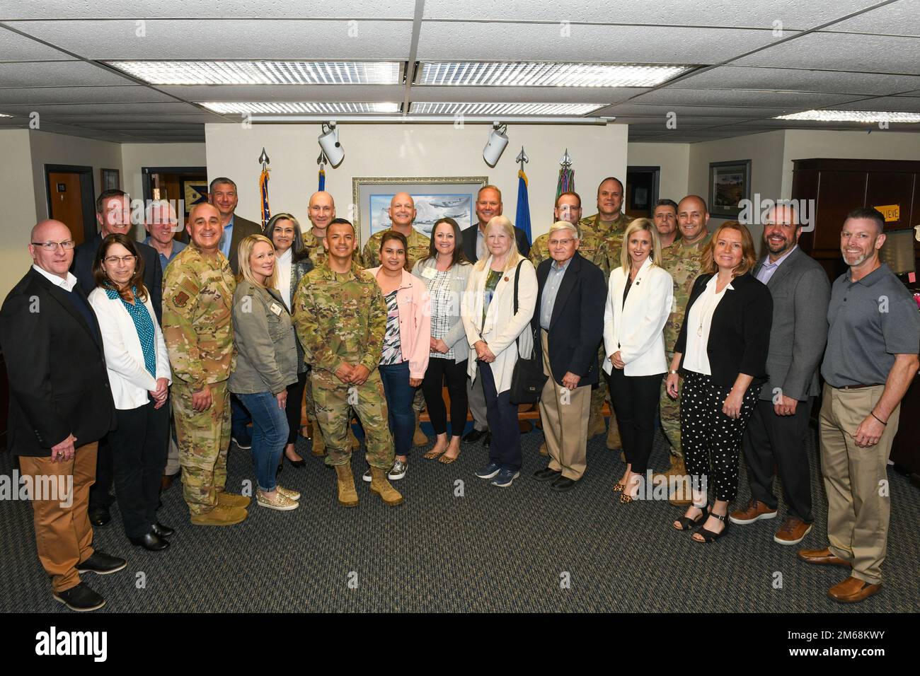 Past and present 97th Air Mobility Wing (AMW) leaders and their spouses ...