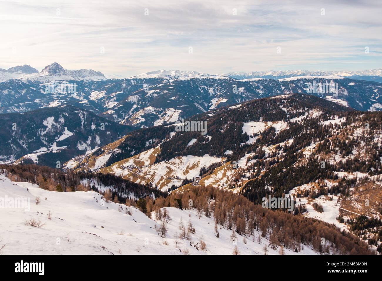 Alpine landscape with snow in winter. Mountain landscape with woods ...